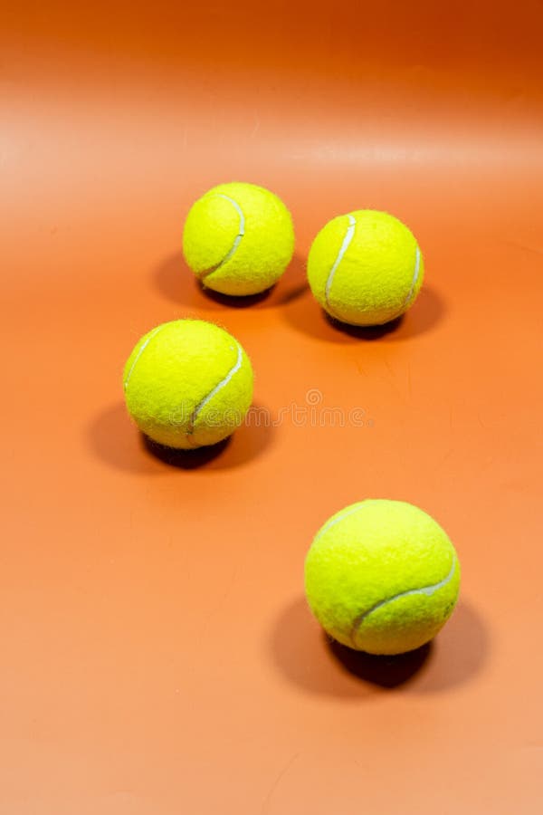 Tennis Balls Arranged Orange Surface Stock Photos - Free & Royalty-Free ...