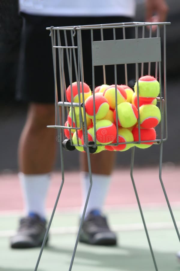 Tennis balls in a basket stock photo. Image of court, tennis - 1227092