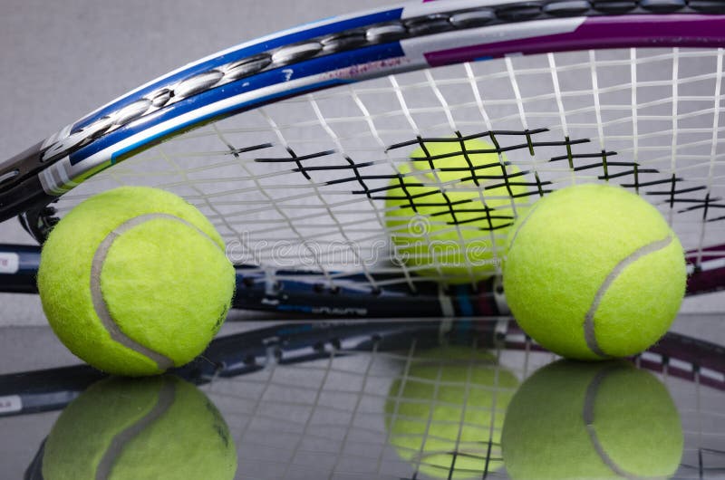 Tennis Balls with racket stock photo. Image of reflection - 59619046