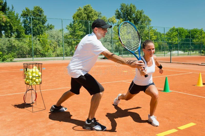 Tennis Coach Working with Female Student Stock Image - Image of people ...