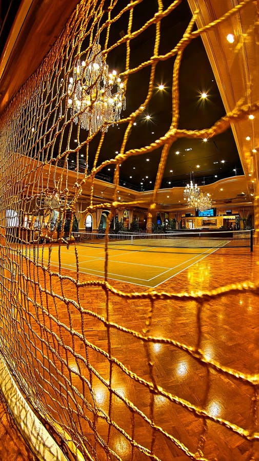 A Tennis Court with a Net and a Chandelier Stock Photo - Image of ...