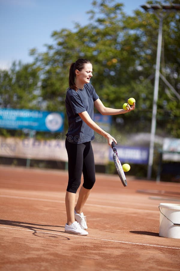 Tennis instructor teaching stock image. Image of female - 36440313
