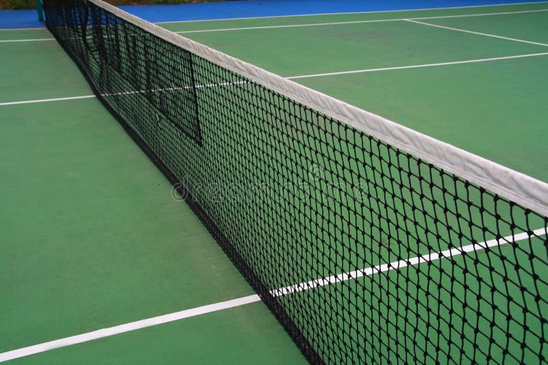 Tennis ball on net stock image. Image of blue, concrete - 34894695