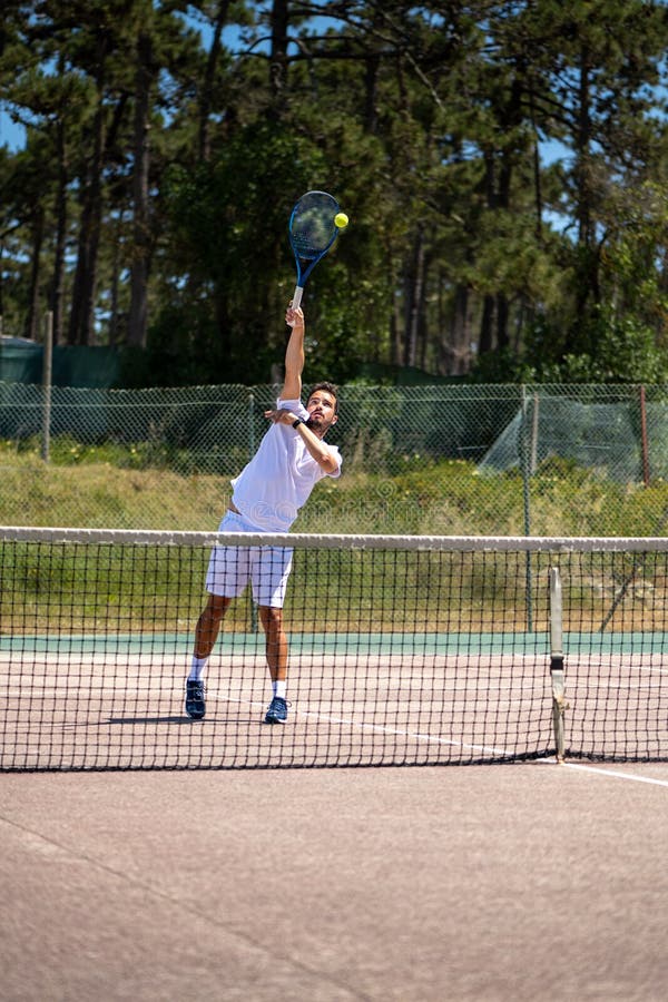 Tennis Player Performing a Smash Stock Photo - Image of person, adult ...