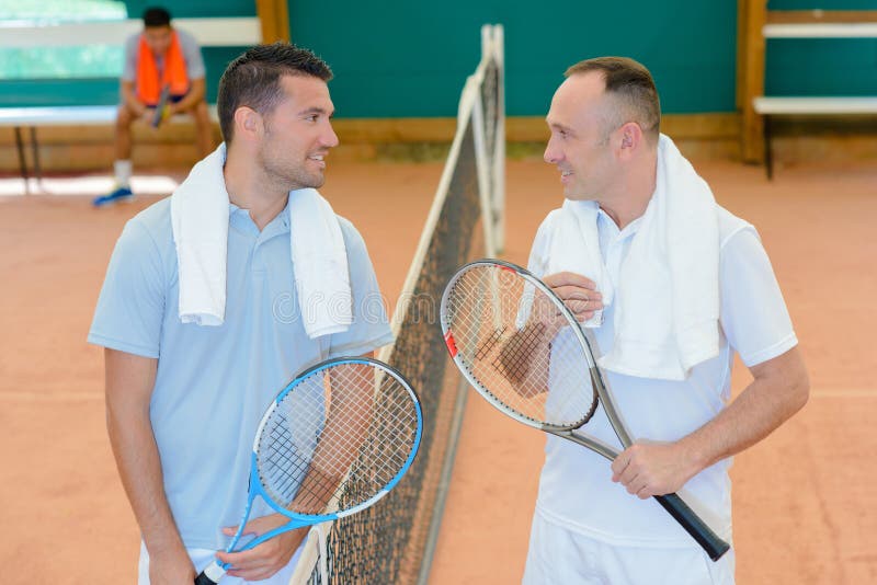 Tennis Players Having Conversation Stock Image - Image of members ...