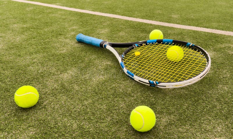 Tennis Racket with a Tennis Ball on a Tennis Court Stock Photo - Image ...