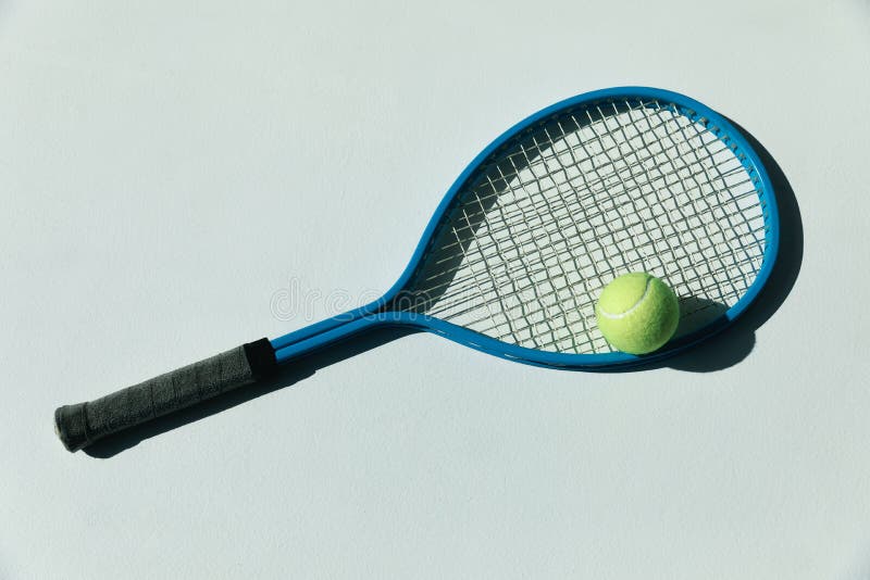 Tennis Racket and Ball on the Floor Stock Photo - Image of indoors ...