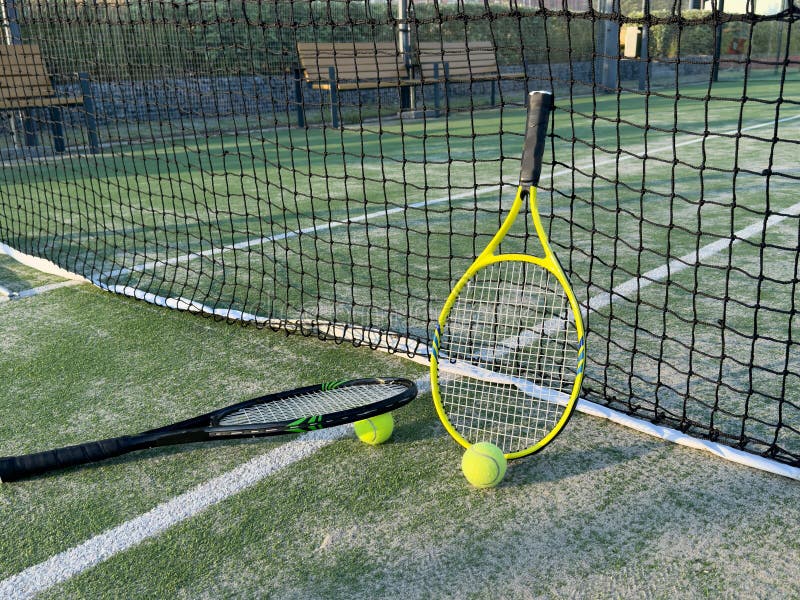 Tennis Racket with Balls on a Grass Court Stock Image - Image of ball ...