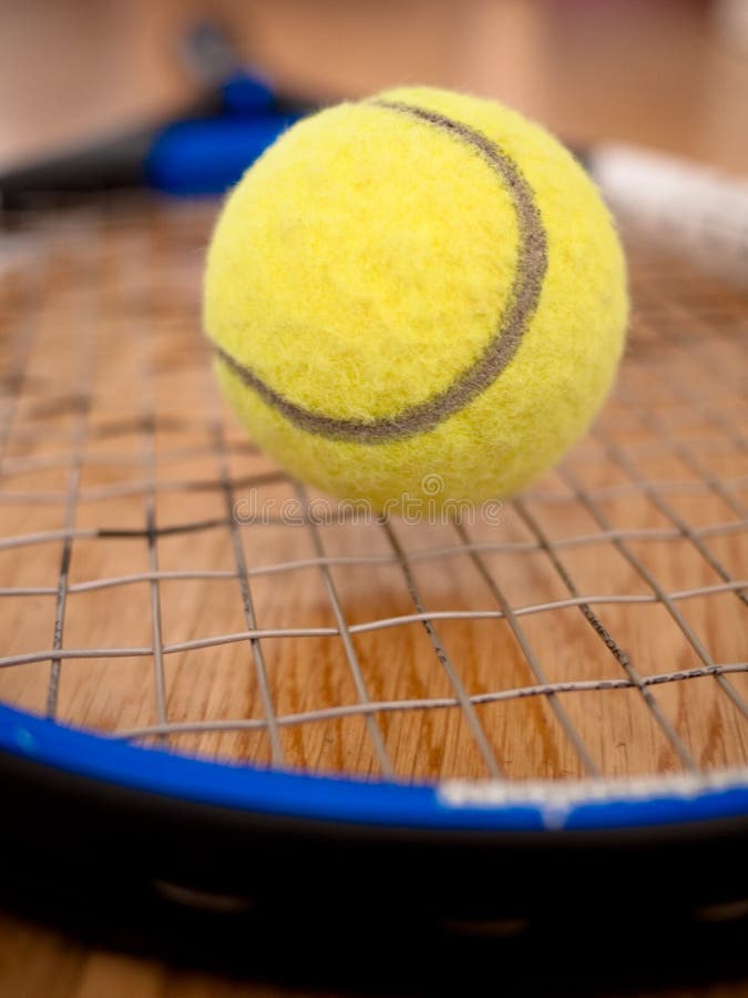 Tennis Racquet and Ball stock photo. Image of strings - 19936750