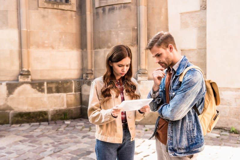 And Tense Couple Looking at Digital Stock Photo - Image of brunette ...