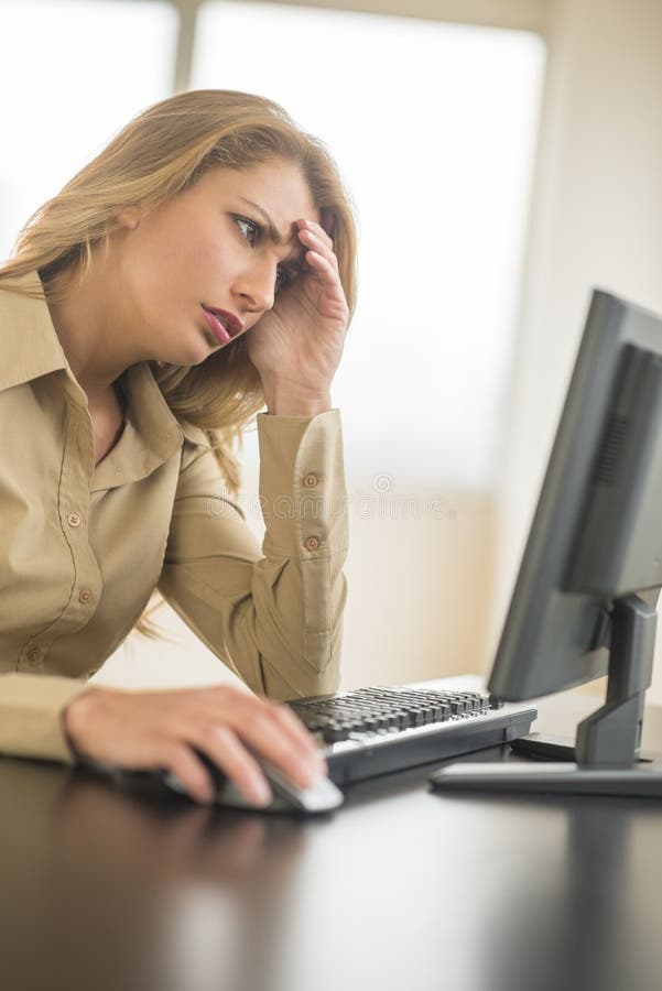 Tensed Businesswoman Using Computer Stock Image - Image of office ...