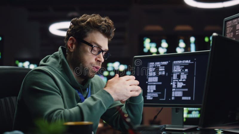 Tensed Coder Solving Problem In Dark Datacenter Closeup Tired Man Working Late Stock Video