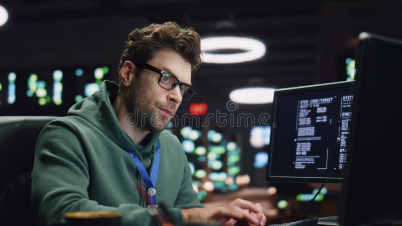 Tensed Coder Solving Problem In Dark Datacenter Closeup Tired Man Working Late Stock Image