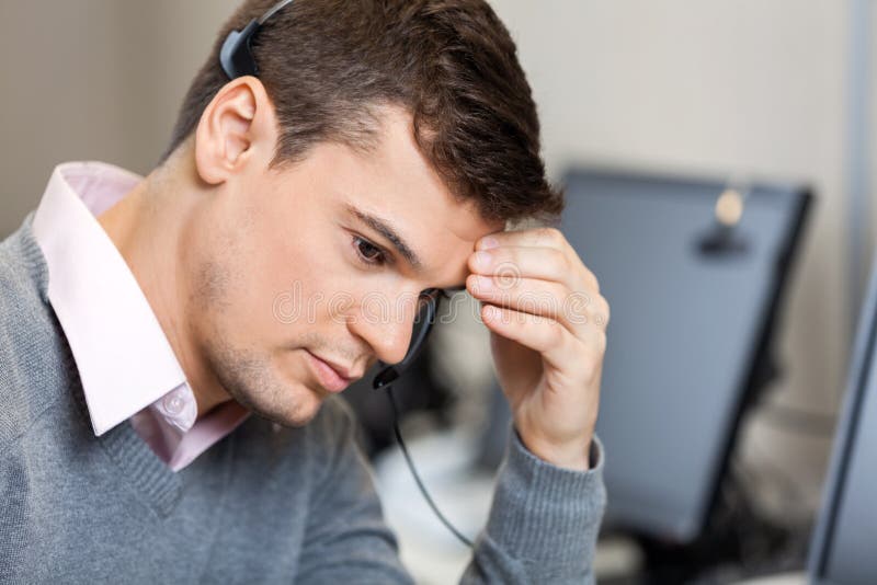 Confused call center agent stock image. Image of camera - 31800363