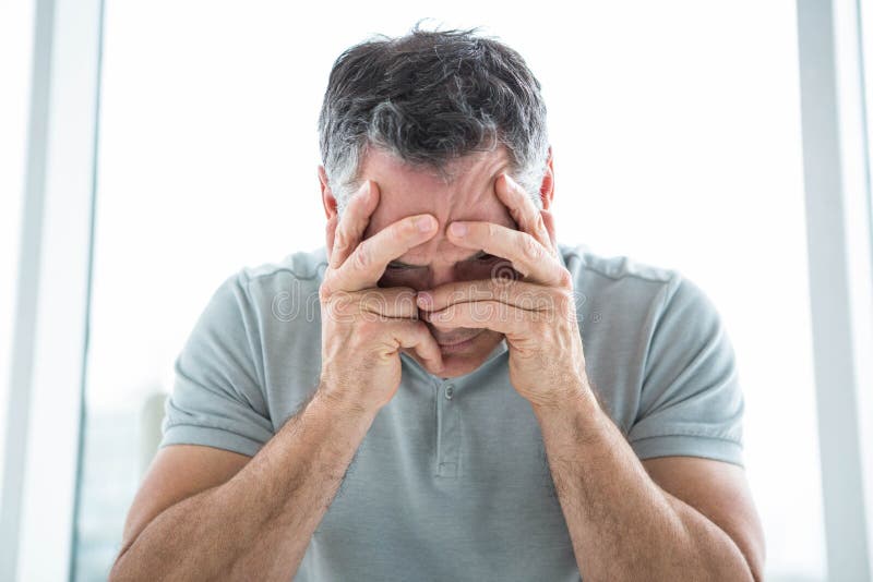 Tensed Man Sitting Against Window Stock Photos - Free & Royalty-Free ...