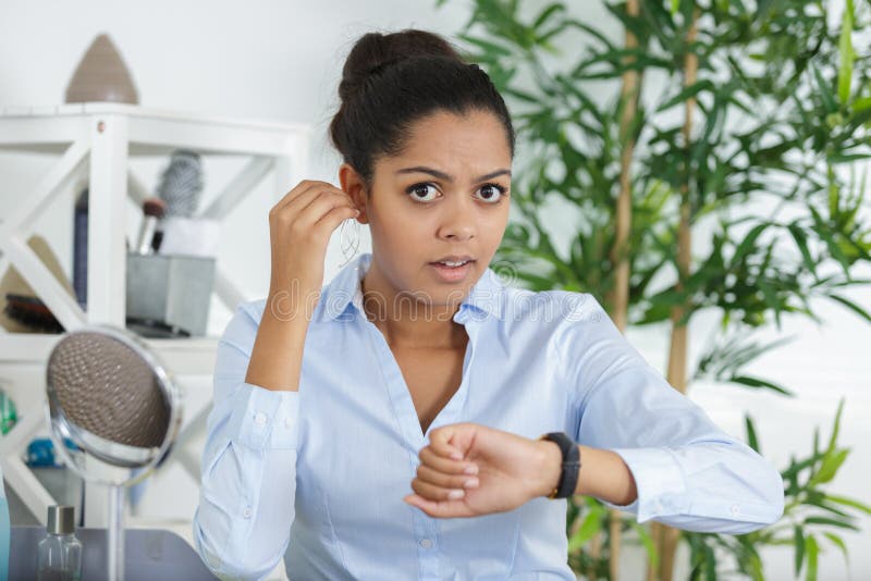 Tensed woman late for work stock photo. Image of businesswoman - 253358340
