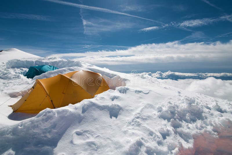 Tent at the Base Camp in Snow Above the Clouds Stock Photo - Image of ...