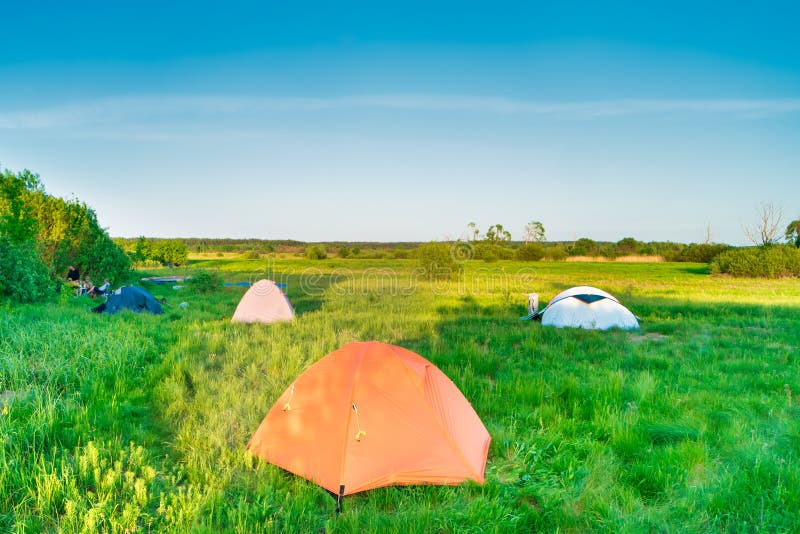 Tent Camping on Green Grass Field Stock Photo - Image of activity ...