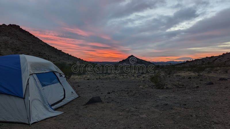 Tent for Camping in the Wilderness during the Sunset Stock Image ...