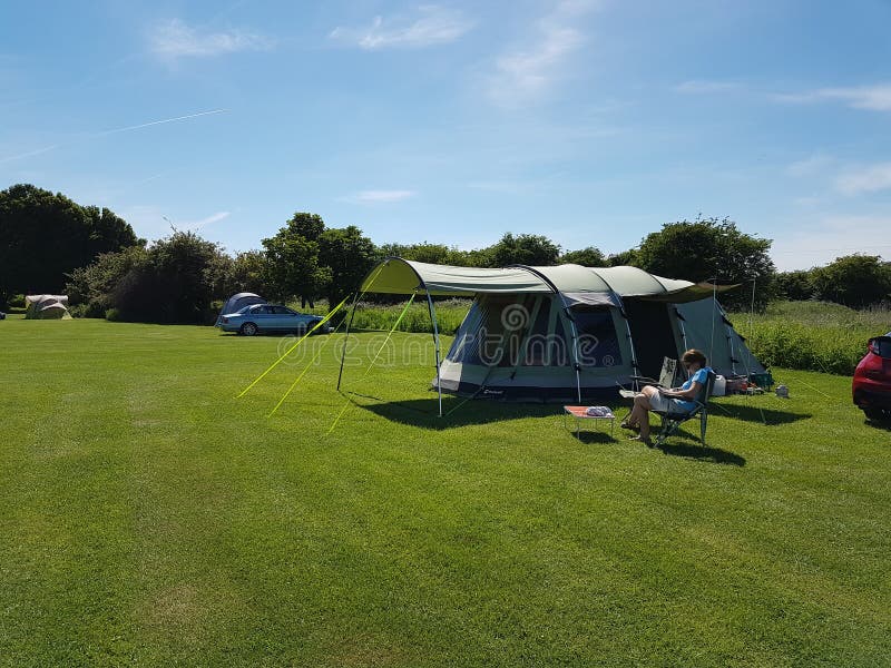 Camping in the uk editorial photography. Image of campsites - 120199022
