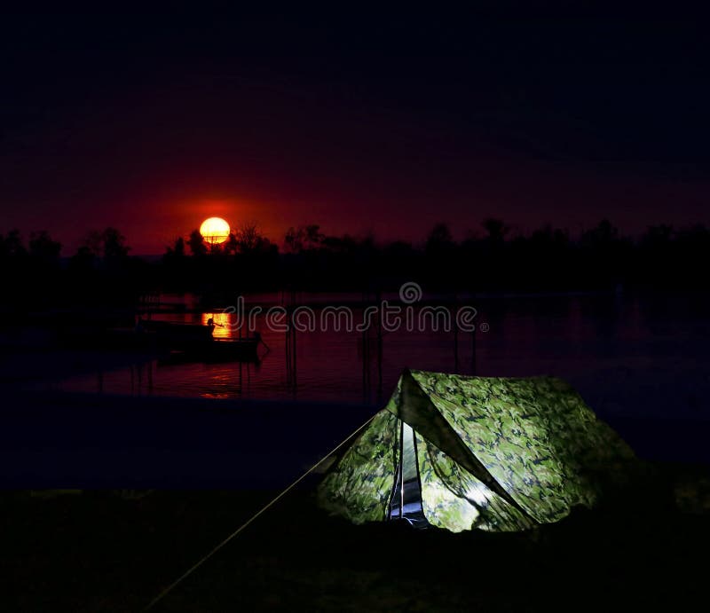 Tent by the lake stock photo. Image of sunset, silhouette - 32379492