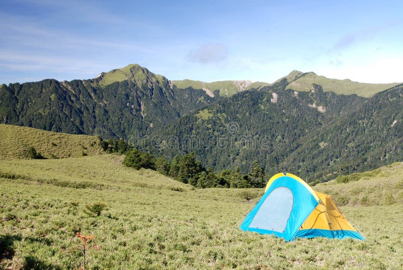 Tent in the mountain. stock image. Image of climbing - 11252123