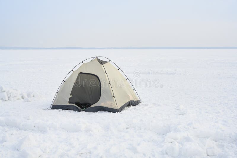 A Tent in the Snow on a Large Plain of a Frozen Lake in Winter Stock ...