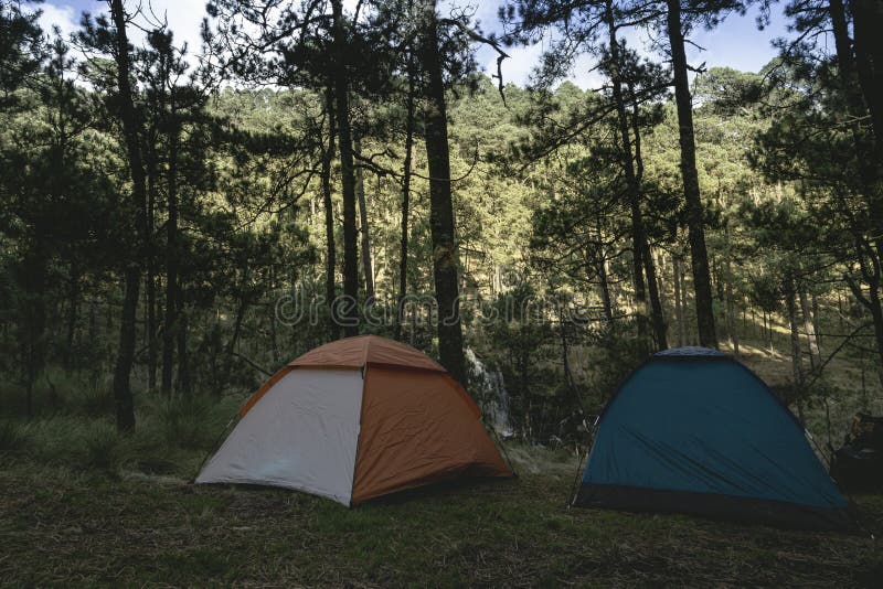 A Tent Stands Camps at a Shore of a Waterfall for a Wild Camping, Away ...