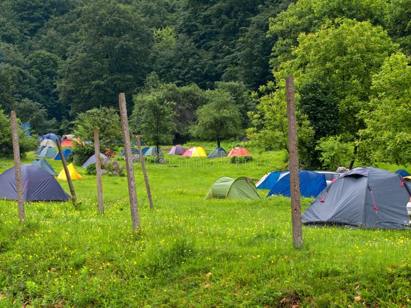 Tent Base at the Edge of a Mountain Forest Stock Photo - Image of base ...