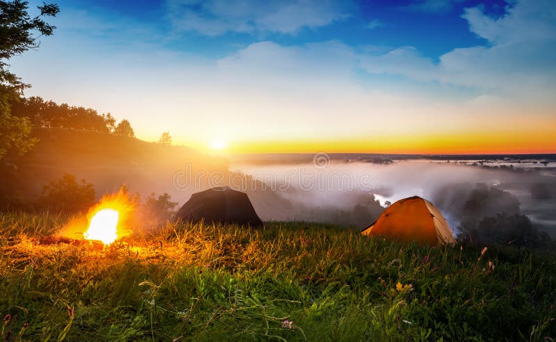 Tents and bonfire stock image. Image of clouds, bonfire - 161516851