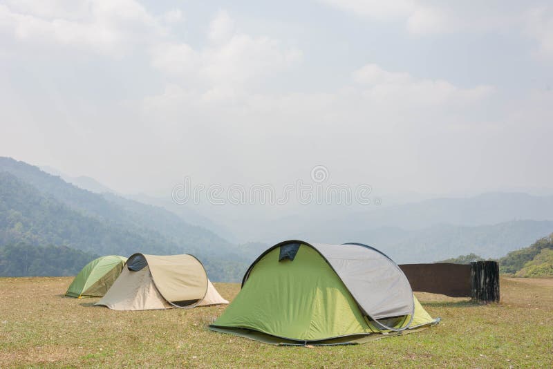 Tents on camping area stock image. Image of holiday, lake - 64108395