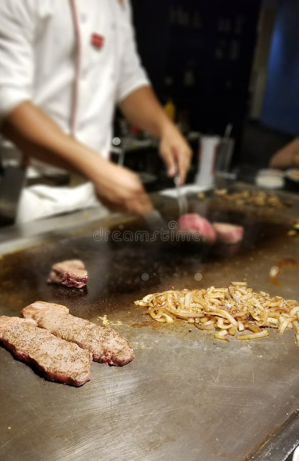 Teppanyaki style cooking stock image. Image of cooking - 123867435