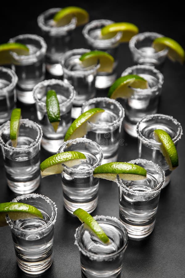 Tequila Shots with Lime and Salt on Black Table Stock Photo - Image of ...