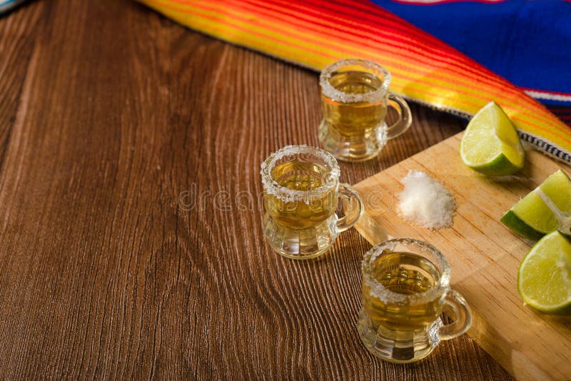 Tequila Shots with Salt and Lime on a Bar Table. Stock Image - Image of ...