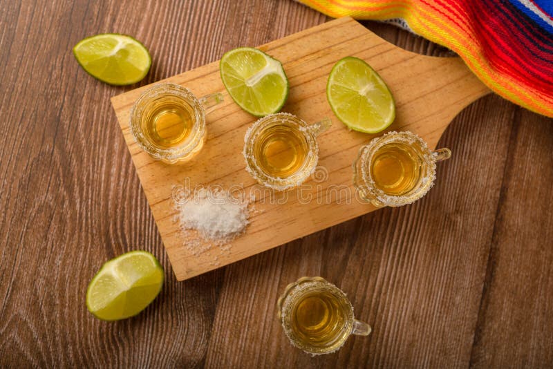 Tequila Shots with Salt and Lime on a Bar Table. Shots of Tequila Stock ...