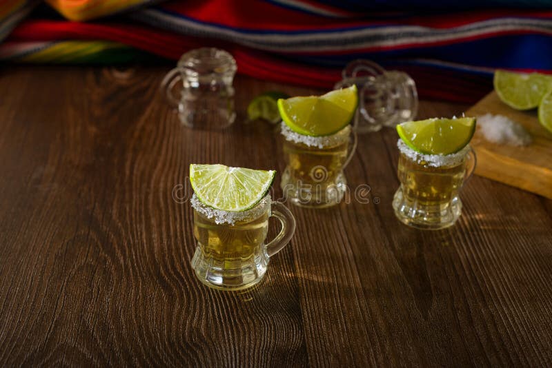 Tequila Shots with Salt and Lime on a Bar Table. Stock Image - Image of ...