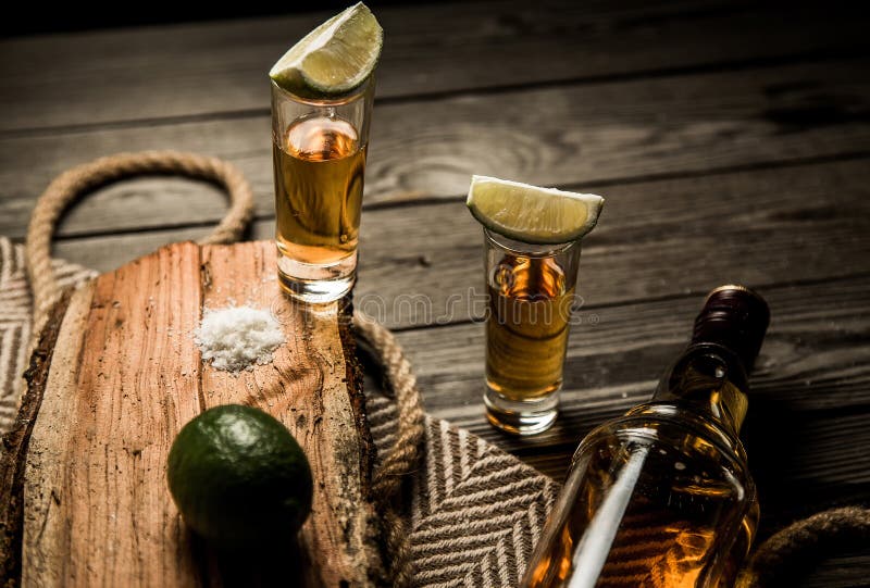 Tequila Stack on a Wooden Background Stock Image - Image of tequila ...