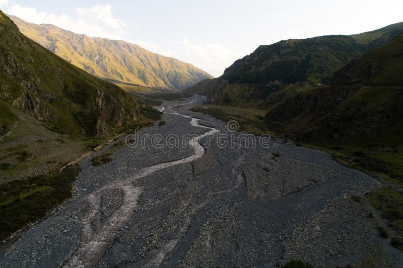 The Terek River Flows through the Daryal Gorge. Stock Image - Image of ...