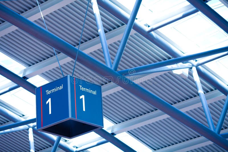 Terminal 1 Sign in Airport Interior Stock Photo - Image of lighted ...