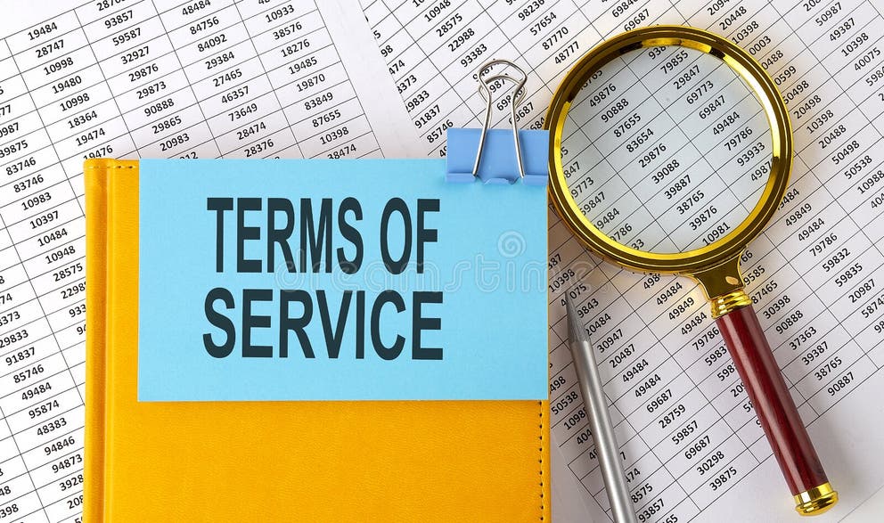 TERMS of SERVICE Text on Sticker on Notebook with Magnifier and Chart ...