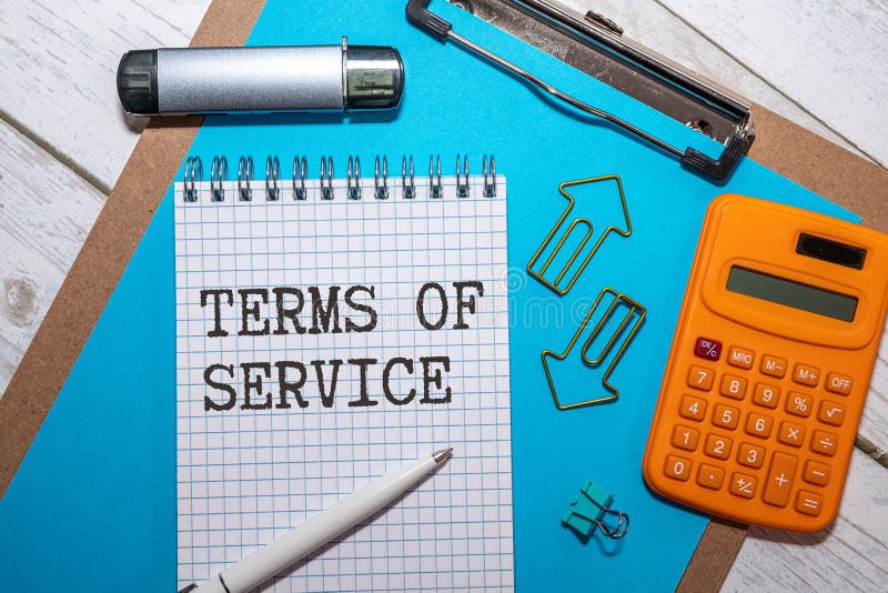TERMS of SERVICE Text Written on Paper Clipboard on Laptop Stock Photo ...