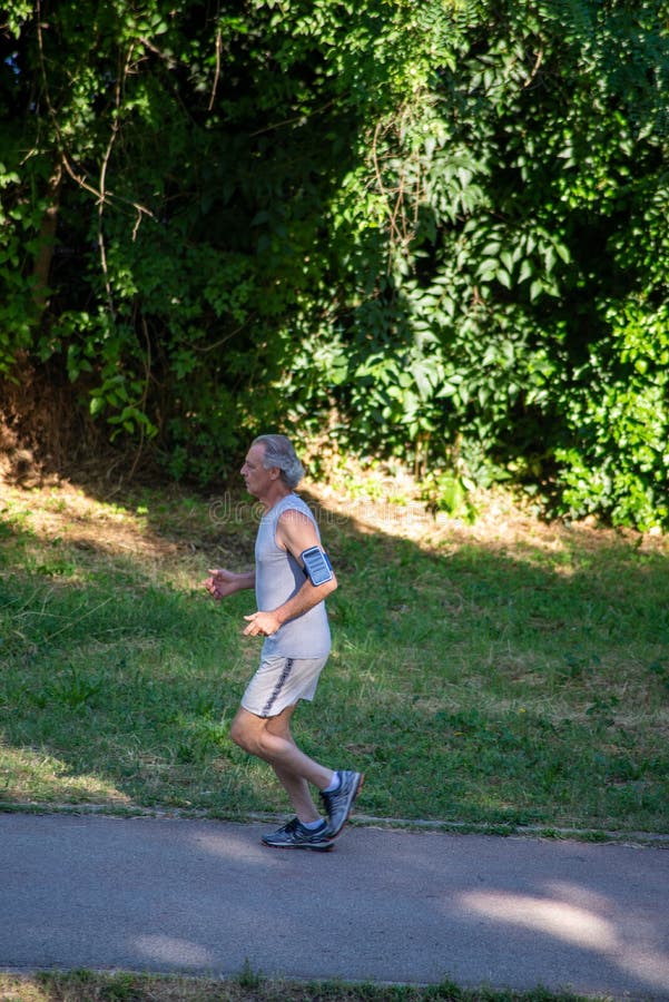 Man Doing Physical Activity at the Park Editorial Stock Image - Image ...