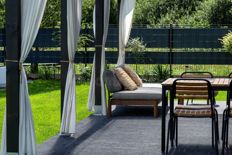 The Terrace Behind the House is Made of Beams, the Roof is Covered with ...