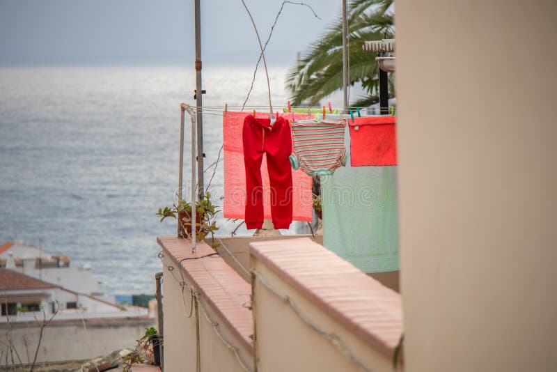 Terrace with Clothes Dryer and Ocean Views Stock Photo - Image of ocean ...