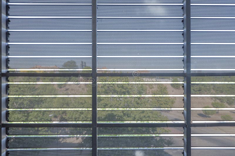 A Terrace Laid with a Metal Grid that Gives the Impression of a Park ...