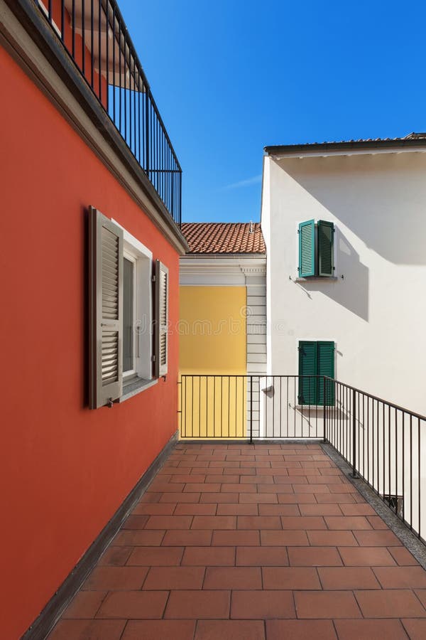 Terrace of a red house stock photo. Image of banister - 71044594