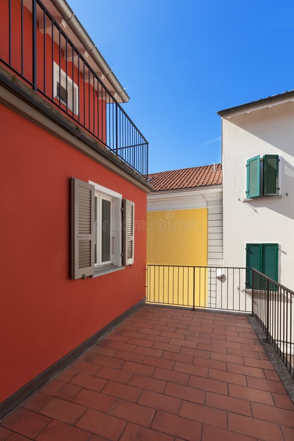 Terrace of a red house stock photo. Image of banister - 71044696