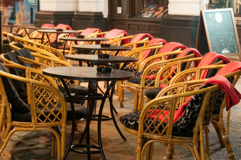 Terrace seats and tables editorial stock image. Image of chairs - 50397369