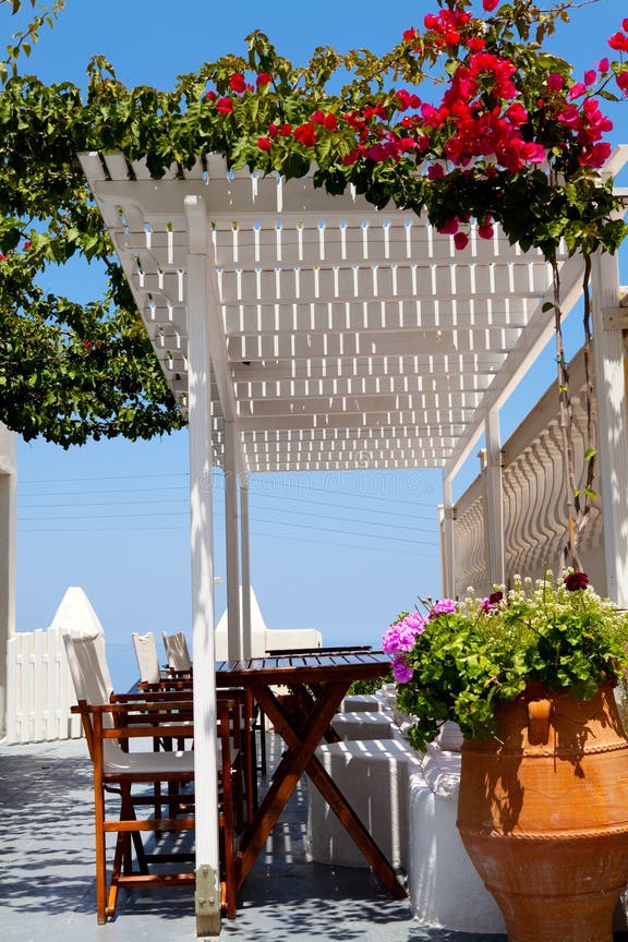 Terrace Setting in Thira, Santorini Stock Photo - Image of tables ...