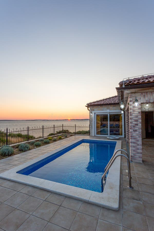 Terrace with Swimming Pool and at Sunset Stock Photo - Image of ...